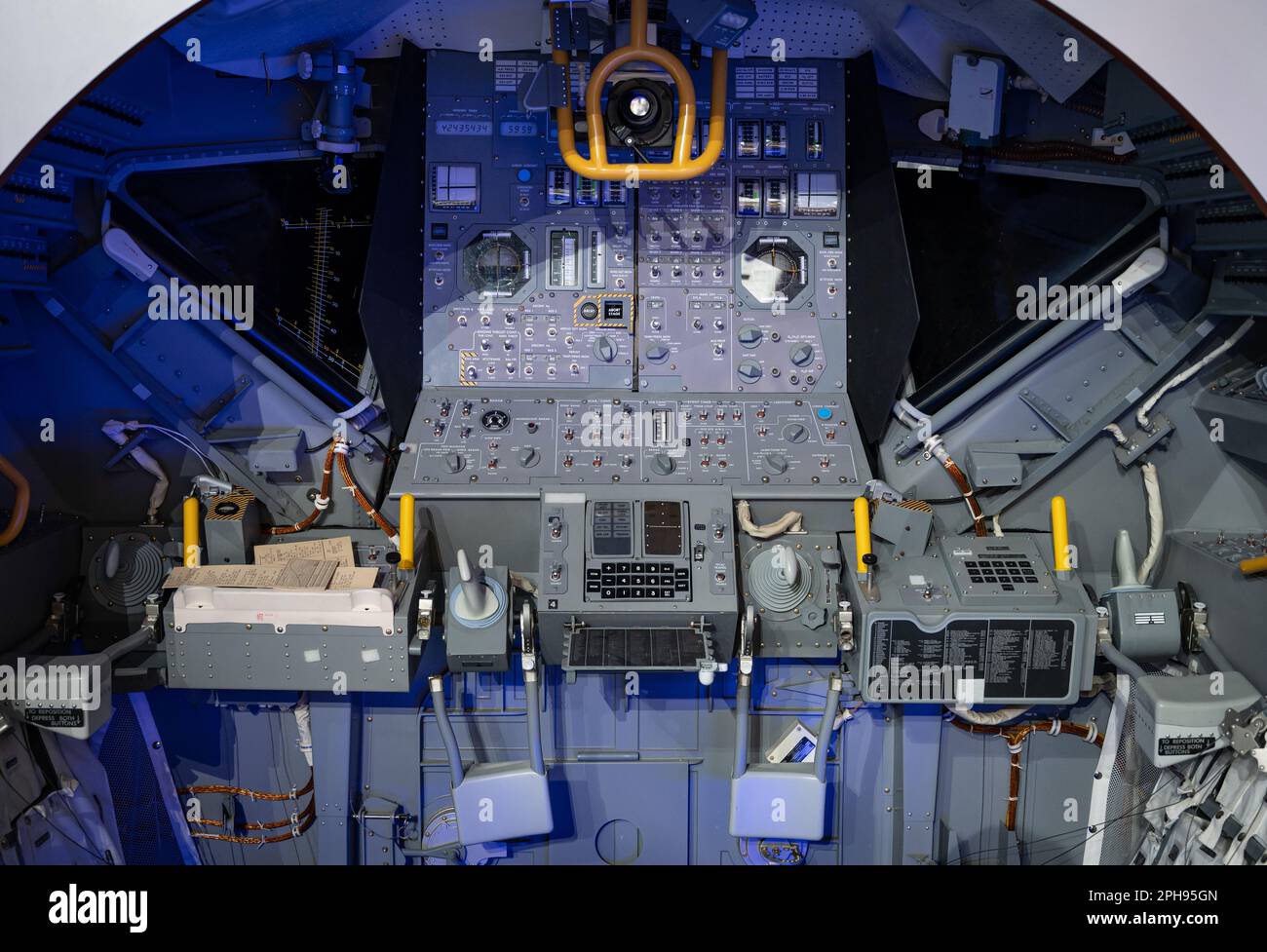 A close-up photograph of the inside of an antique rocket ship cockpit ...