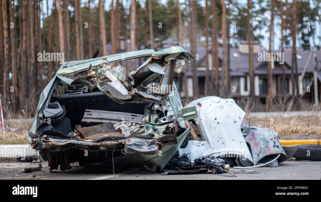 Broken crumpled car after a severe accident with a skewed body, after a ...