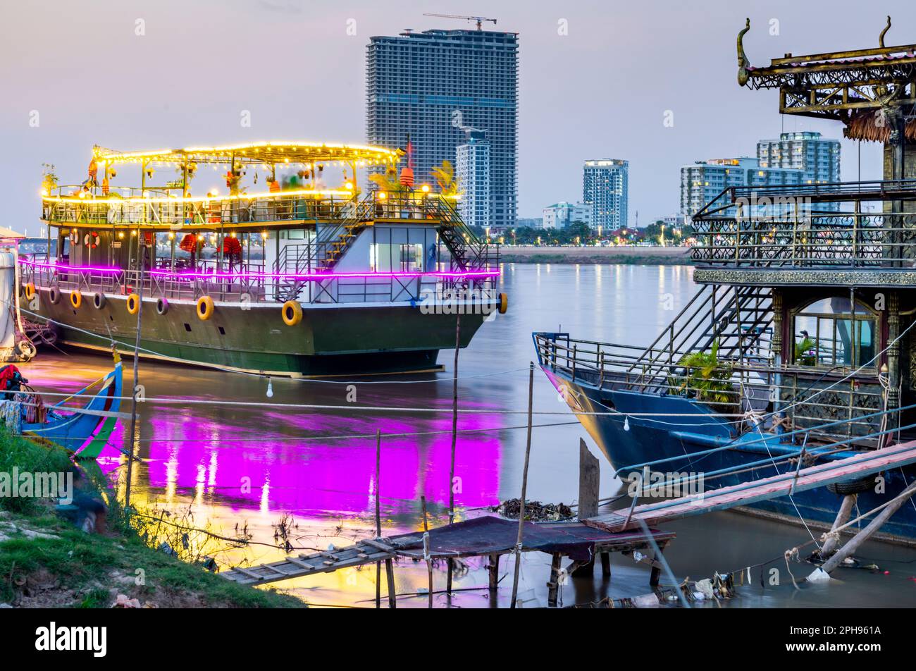 Colorfully lit at dusk,on the Riverside area of Phnom Penh,used as a ...