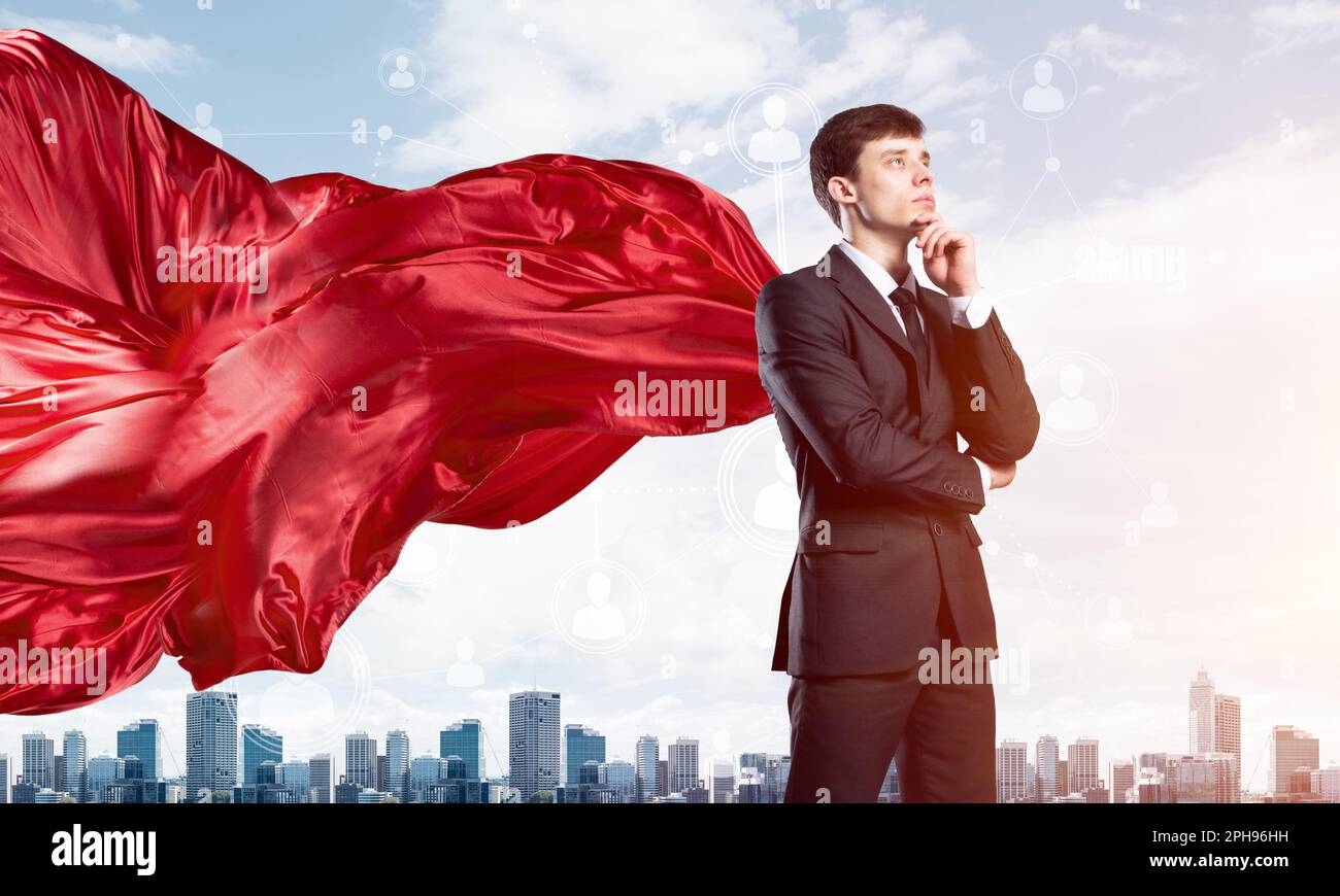 Concept of power and sucess with businessman superhero in big city ...