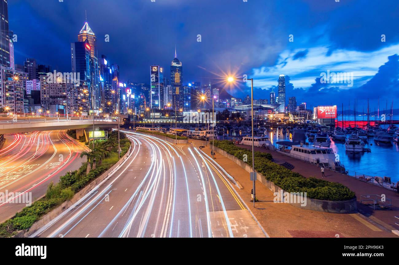 View of Causeway Bay Typhoon Shelter and city skyline at dusk from a ...