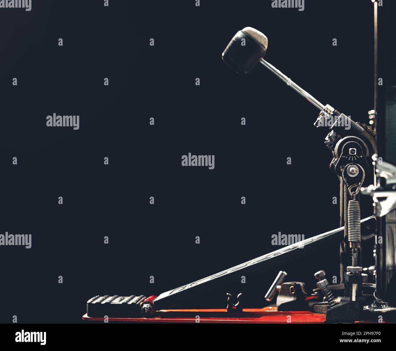 Bass drum with pedal, musical instrument on black background Stock ...