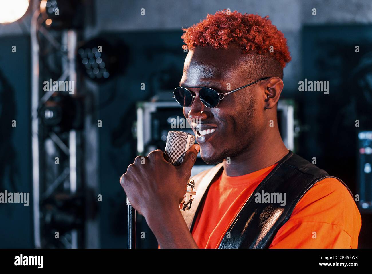 Young african american performer rehearsing in a recording studio Stock ...