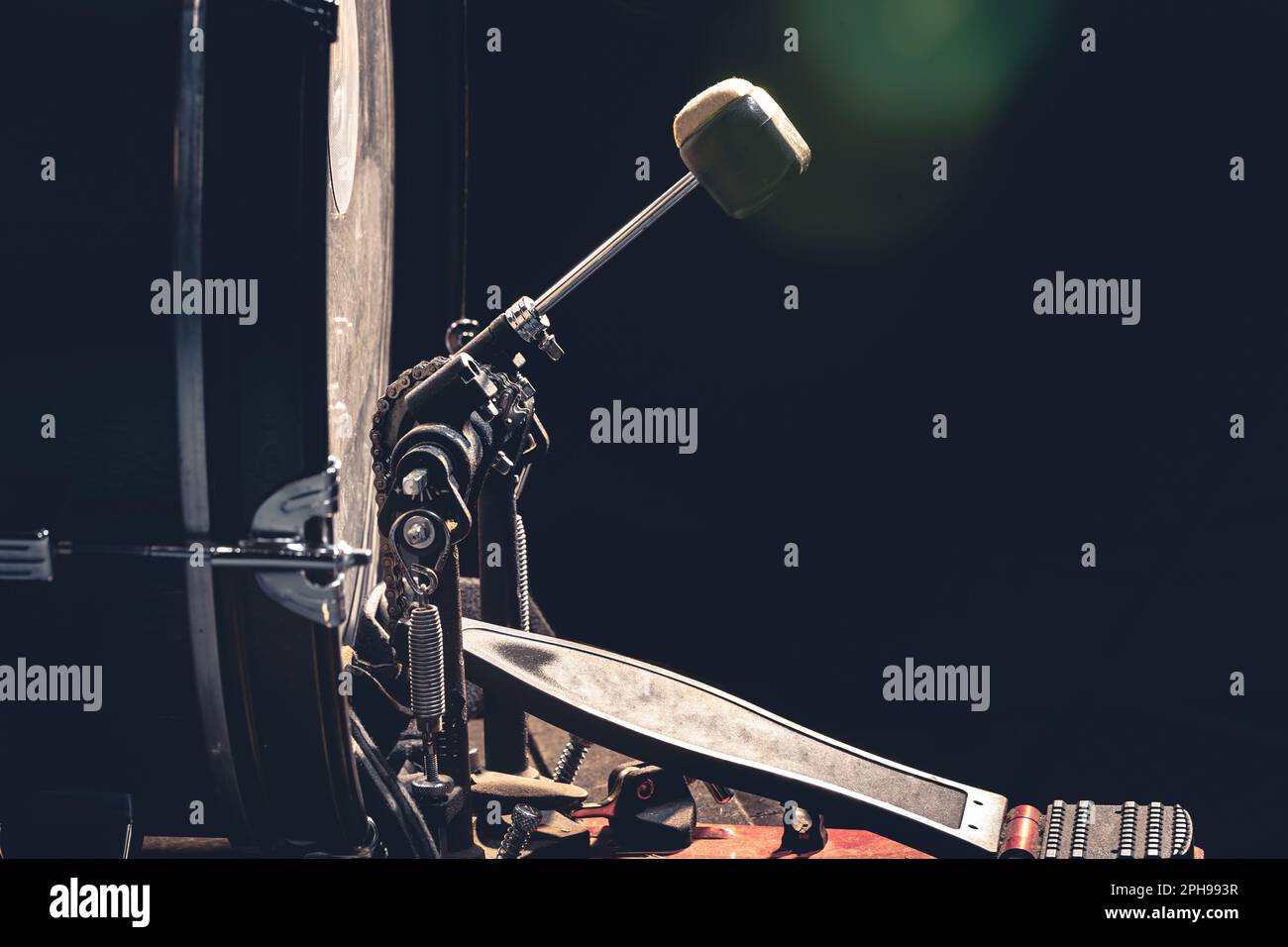 Bass drum with pedal, musical instrument on black background Stock ...