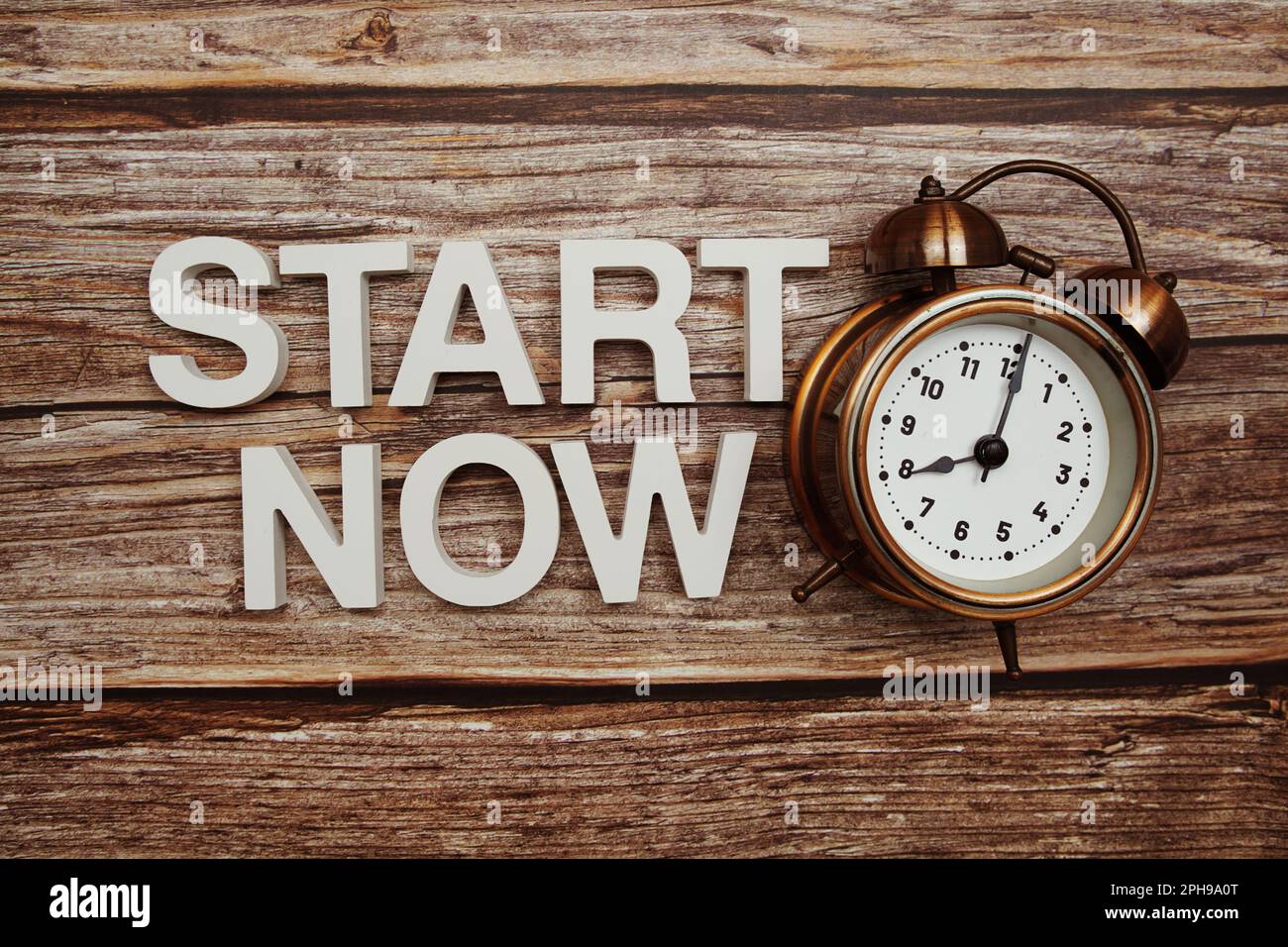 Start Now Word alphabet letters on wooden background Stock Photo - Alamy
