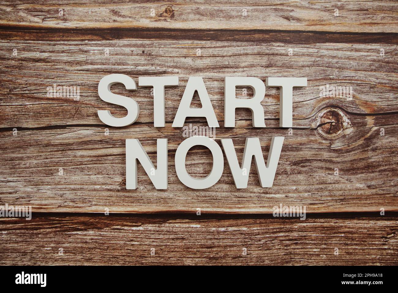 Start Now Word alphabet letters on wooden background Stock Photo - Alamy