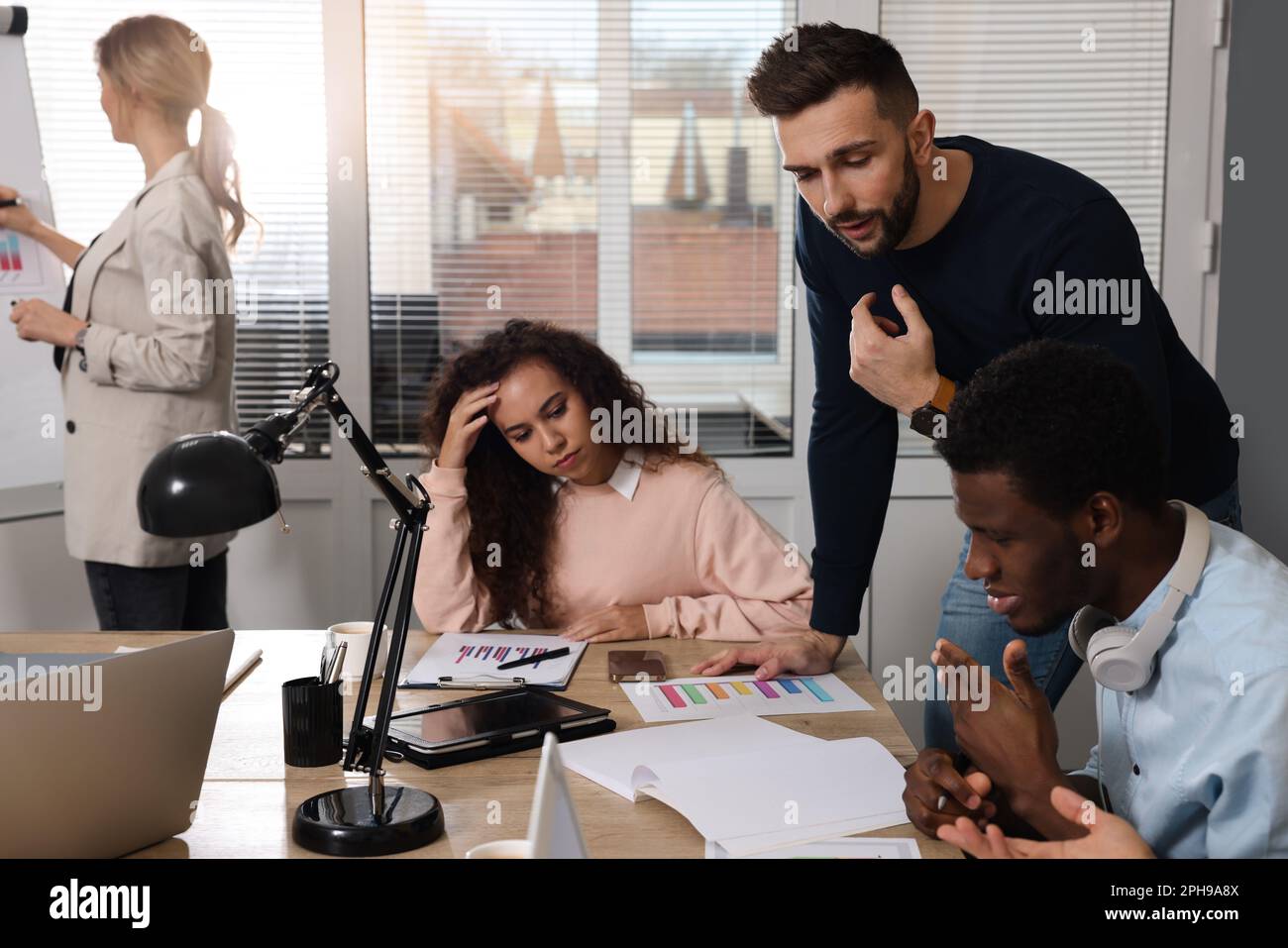 Team of employees working together in office. Startup project Stock ...