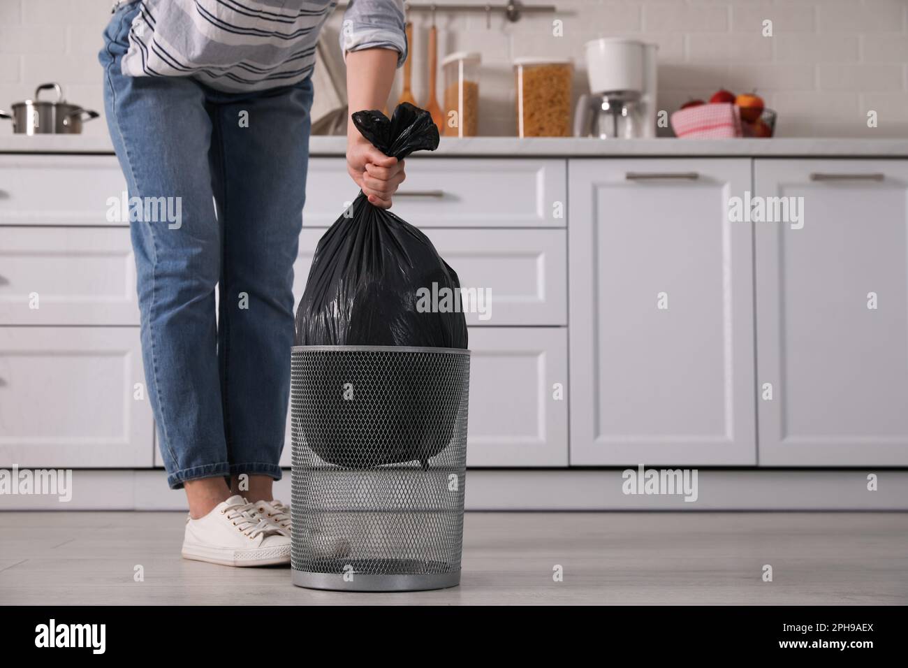 Taking out rubbish female hi-res stock photography and images - Alamy