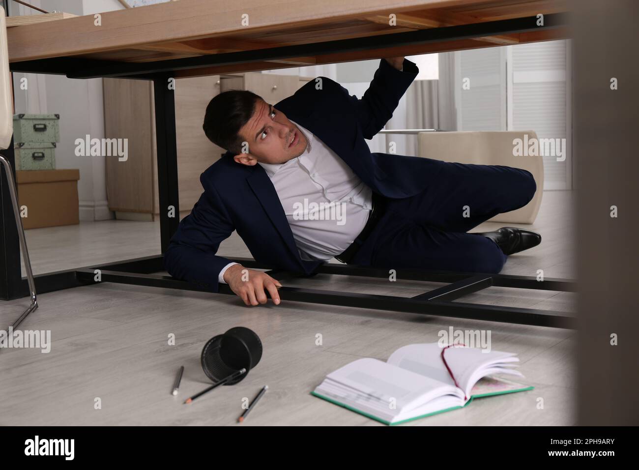 Man Hiding Under Floor Businessman Entering Room Young Man Hiding