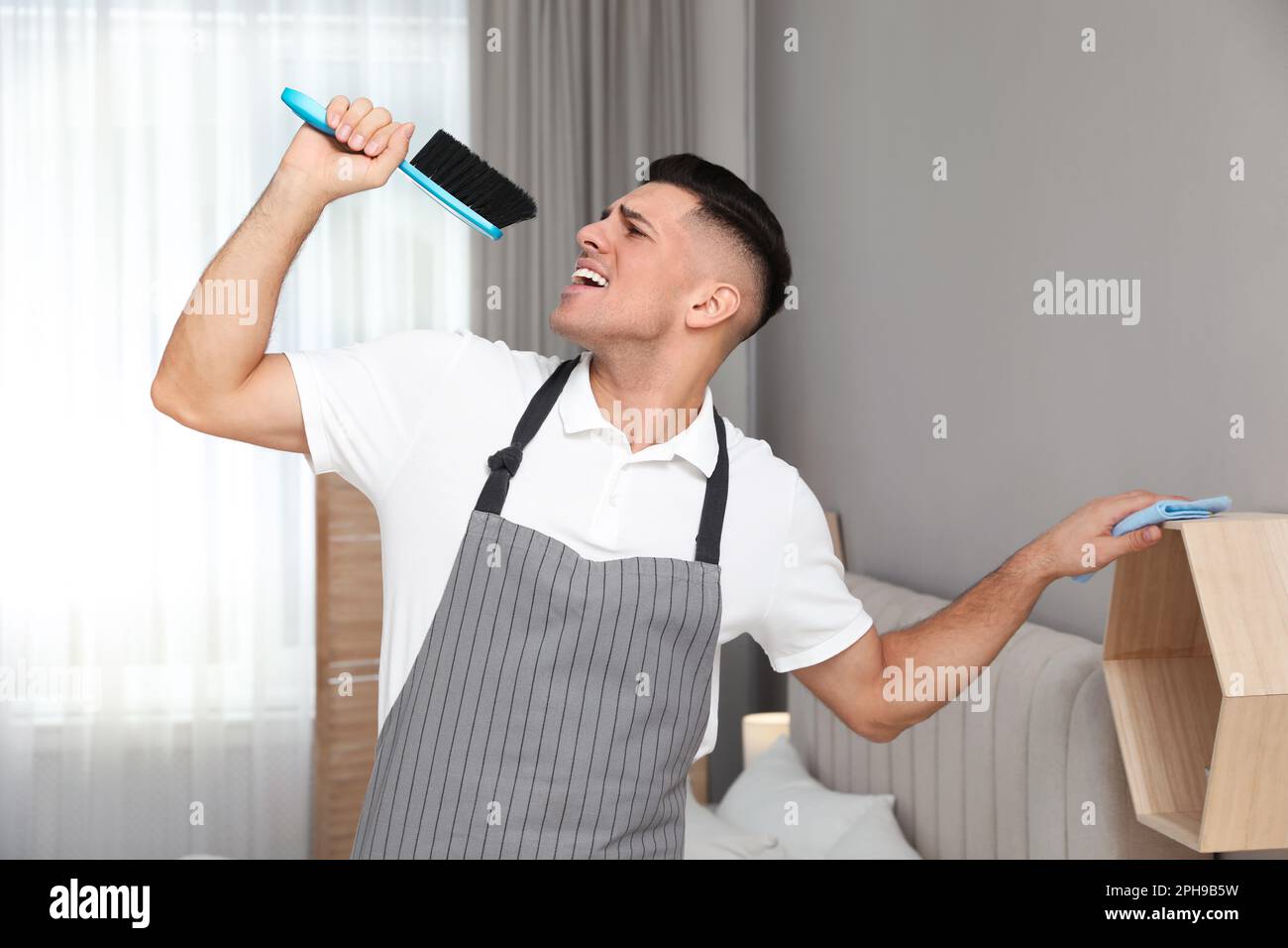 Housekeeping pretending hi-res stock photography and images - Alamy