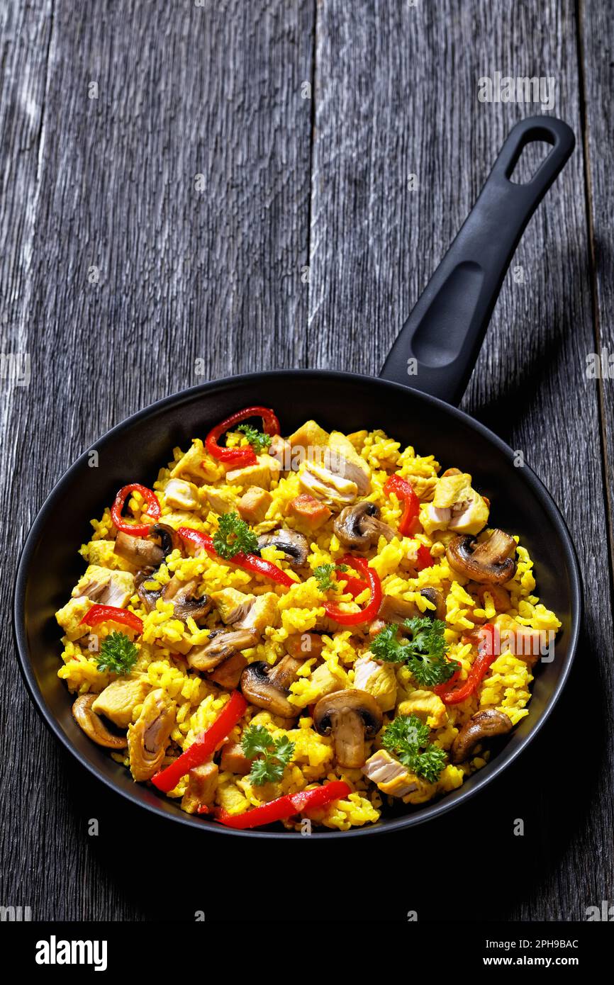 Chicken Paella of arborio rice, chicken fillet, mushrooms, julienned ...