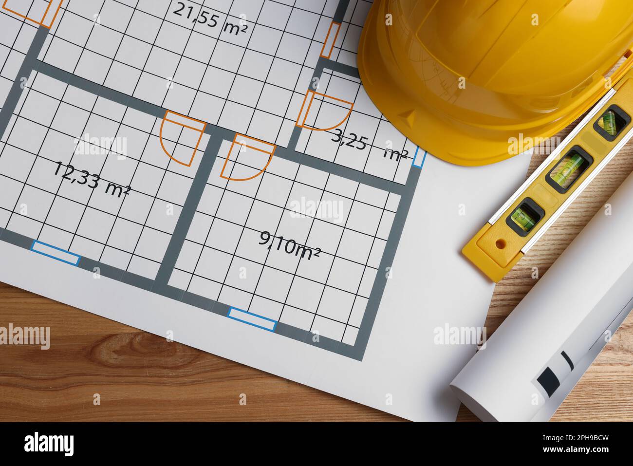 Construction level helmet rolled hi-res stock photography and images ...