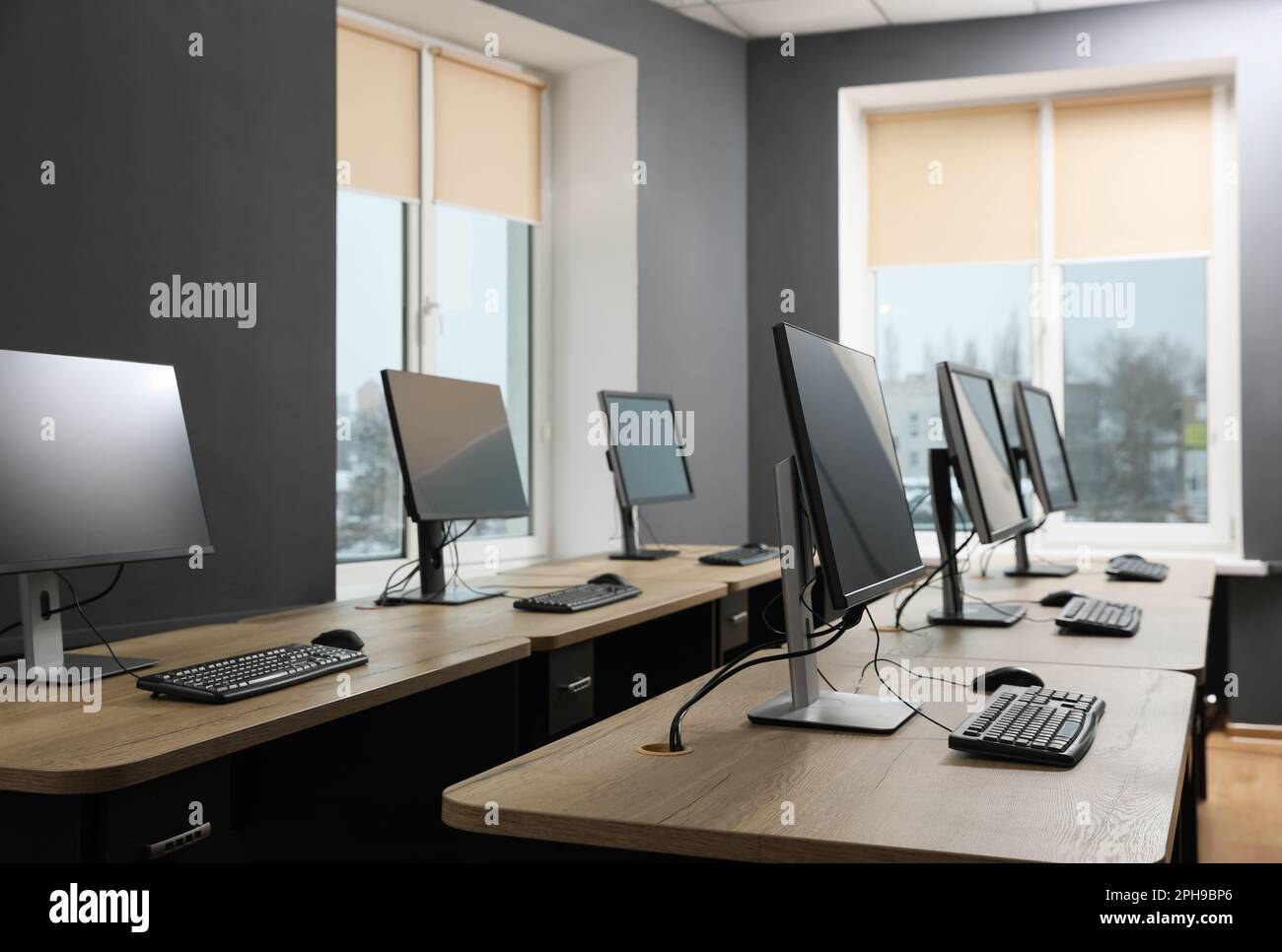 Rows of computers in empty office hi-res stock photography and images ...