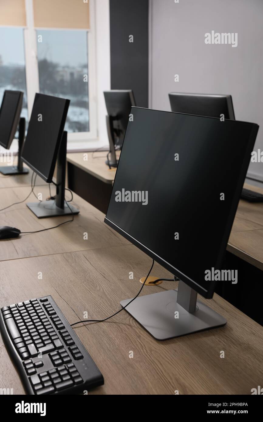 Many modern computers in open space office Stock Photo - Alamy
