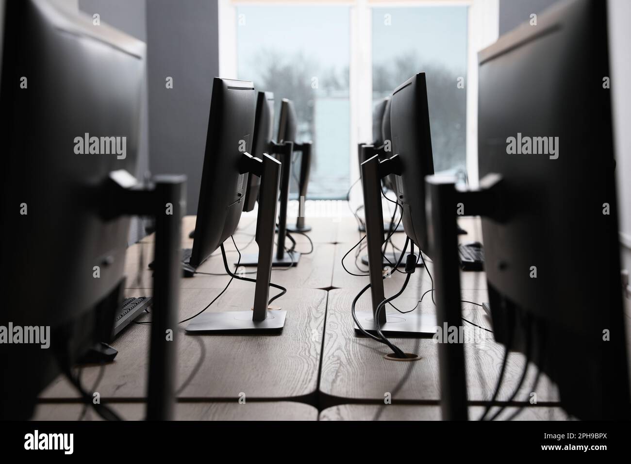 Many modern computers in open space office Stock Photo - Alamy