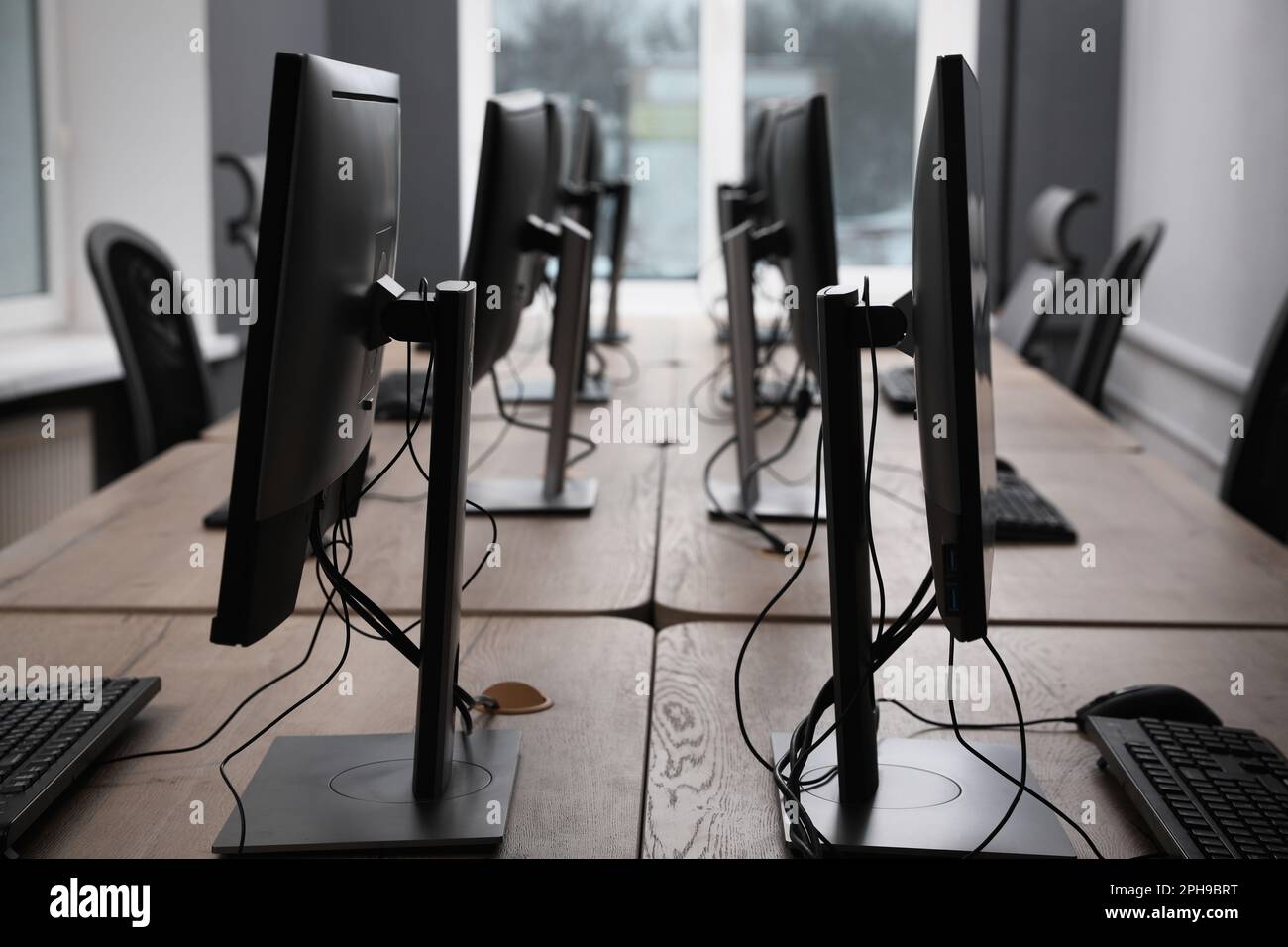 Many modern computers in open space office Stock Photo - Alamy