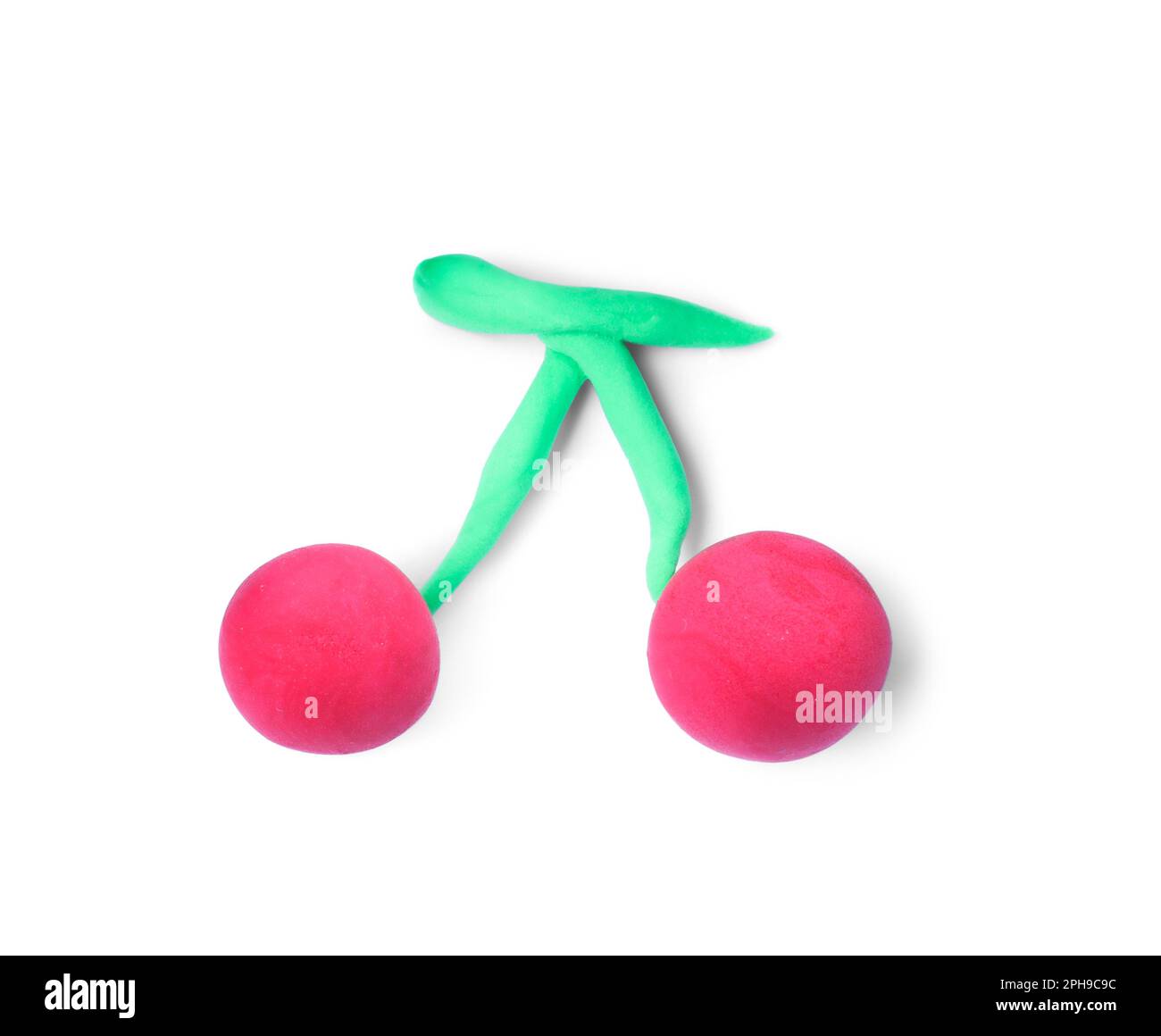 Red cherries made from play dough on white background, top view Stock ...
