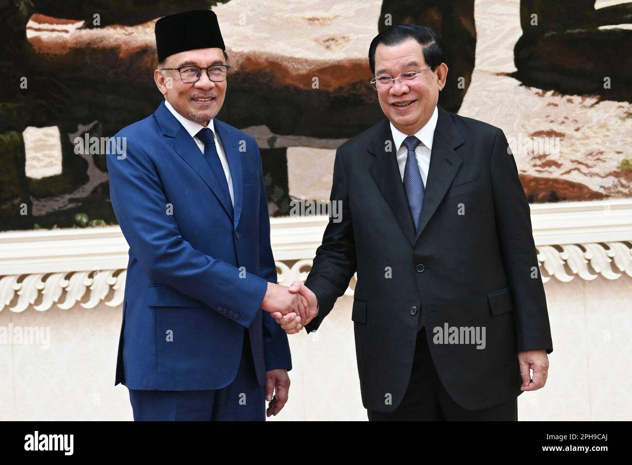 In this photo provided by Cambodia's Government Cabinet, Cambodian ...