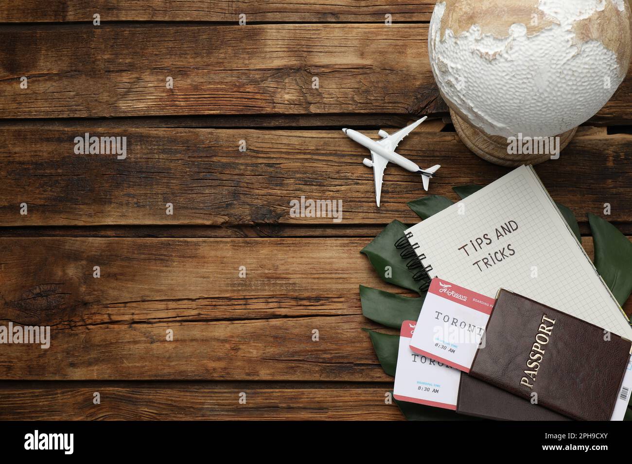 Flat lay composition with notebook on wooden table, space for text ...