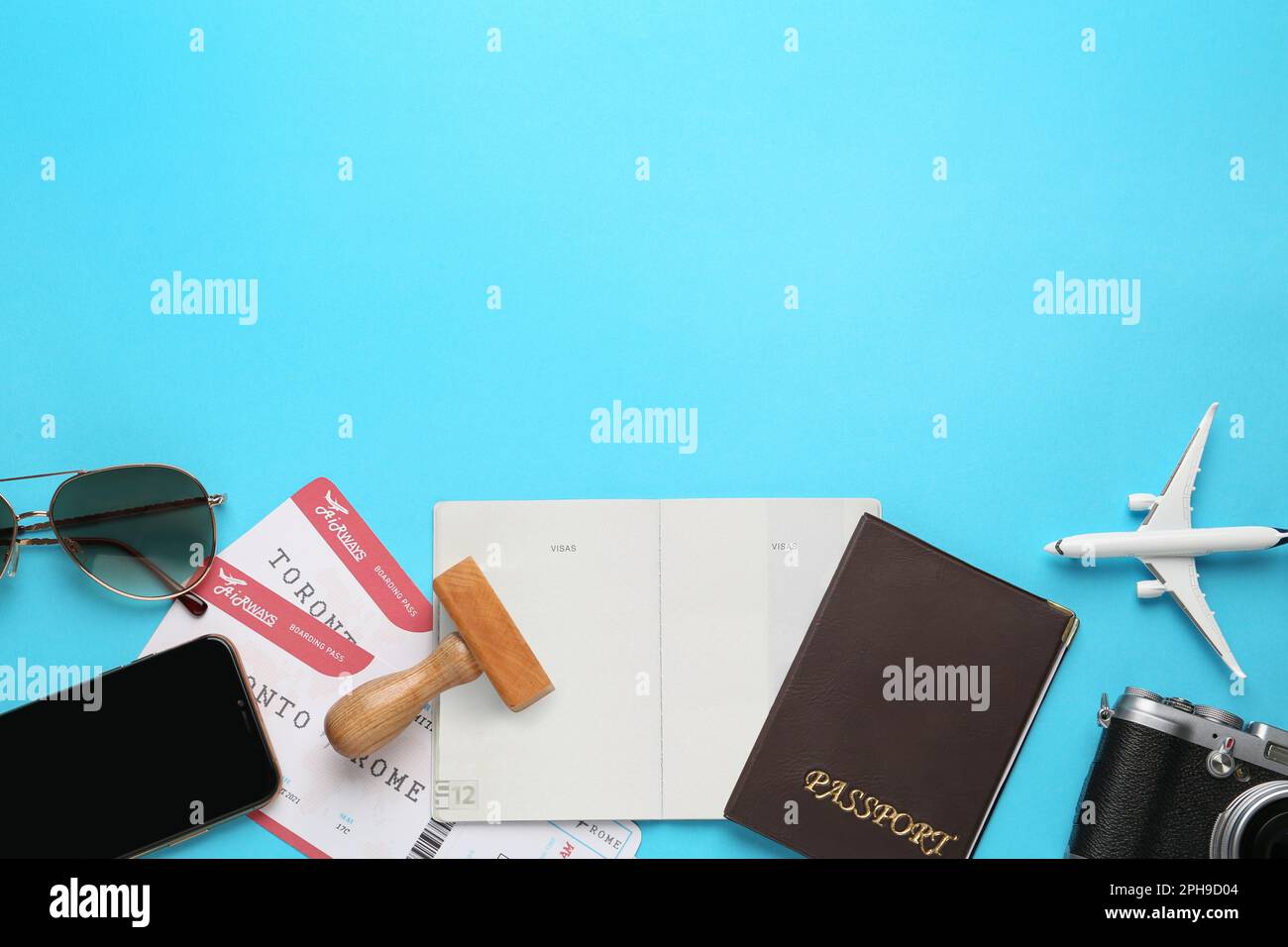 Flat lay composition with passports, stamp and flight tickets on light ...