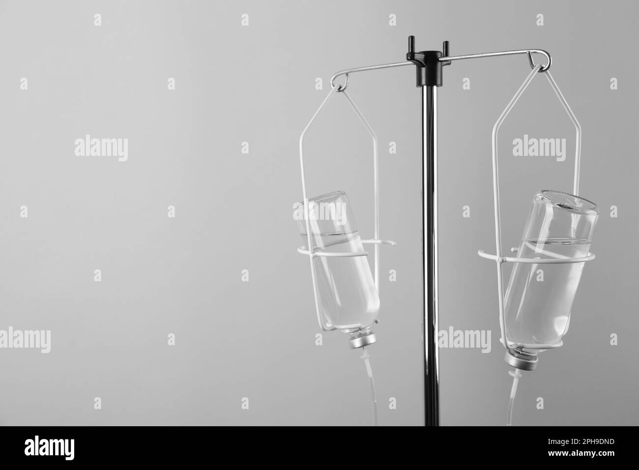 IV infusion set on light grey background. Space for text Stock Photo ...