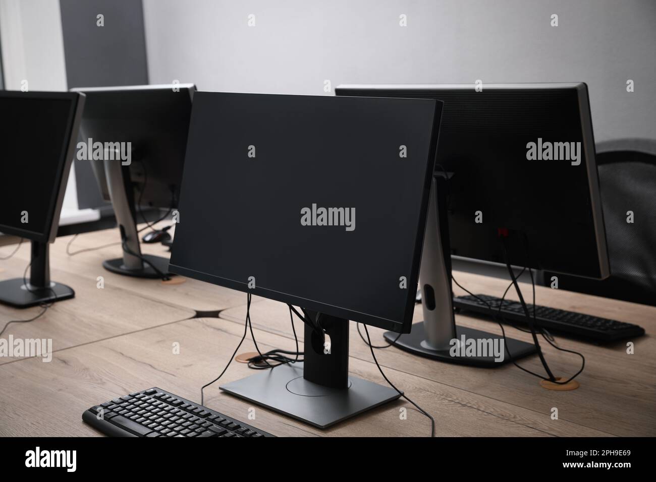 Many modern computers in open space office Stock Photo - Alamy