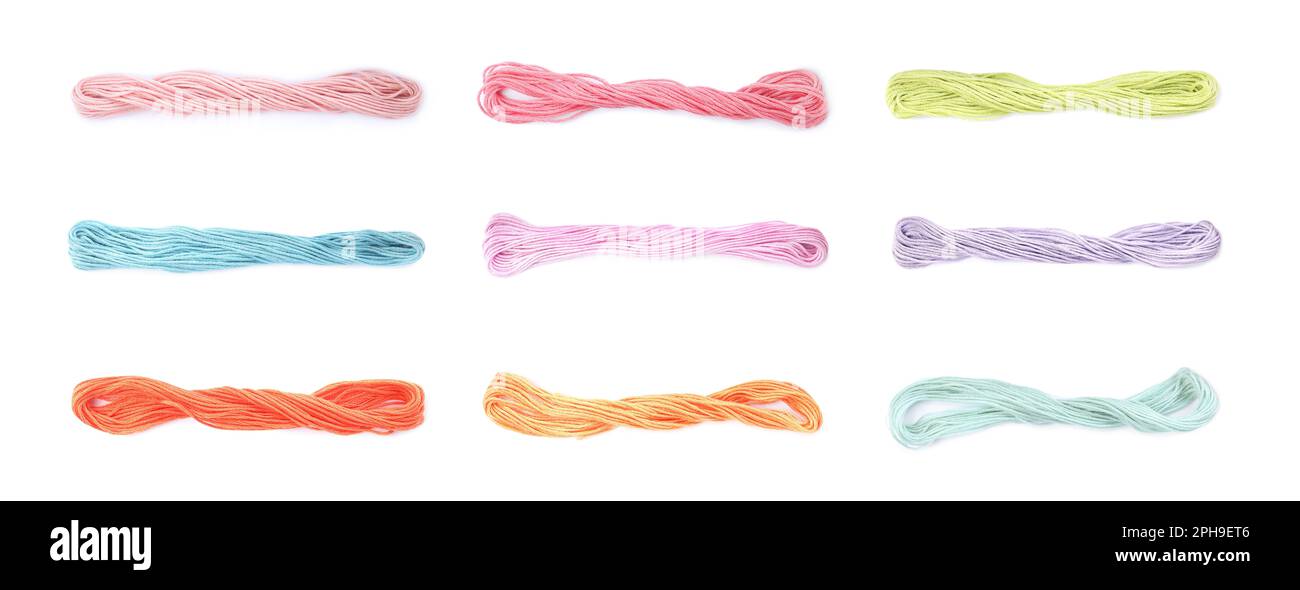 Set with multicolor embroidery threads on white background. Banner ...