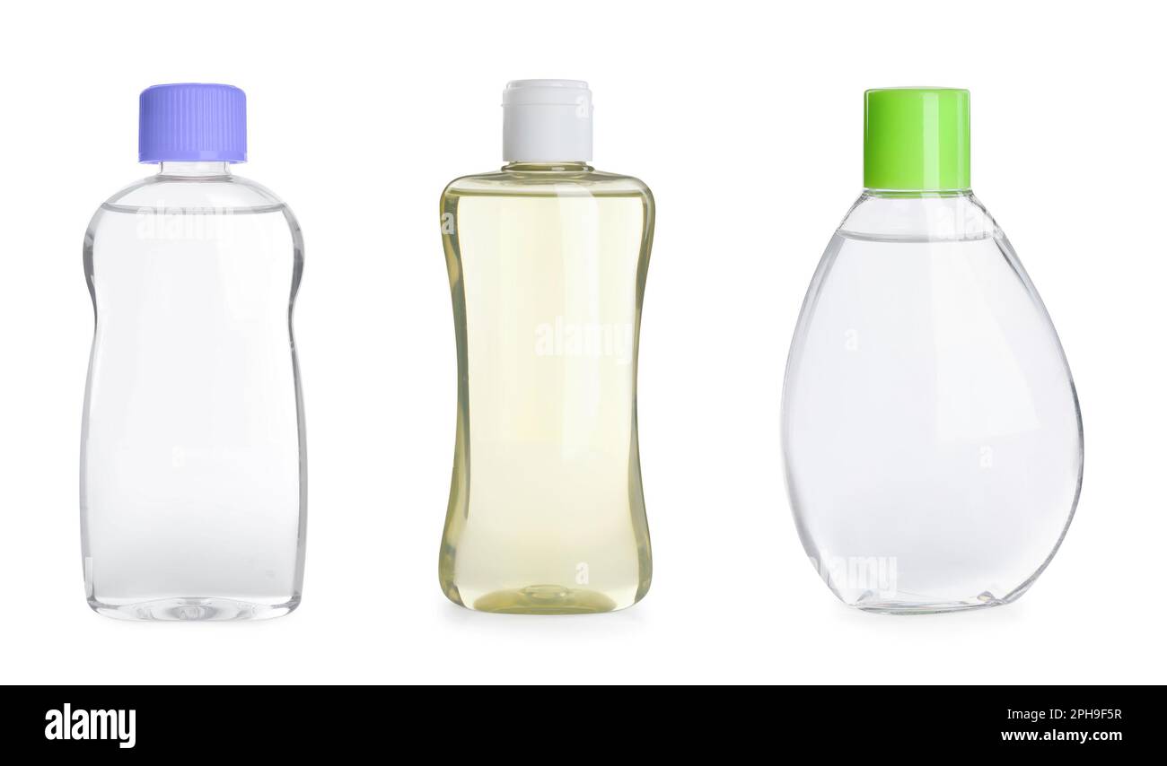Set with bottles of baby oil on white background Stock Photo - Alamy