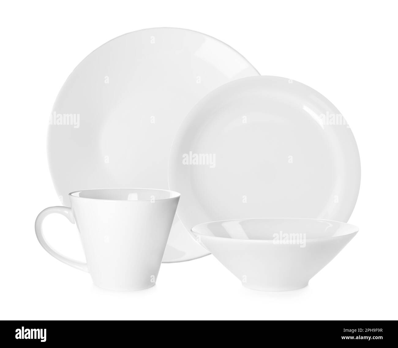 Set of beautiful ceramic dinnerware on white background Stock Photo - Alamy