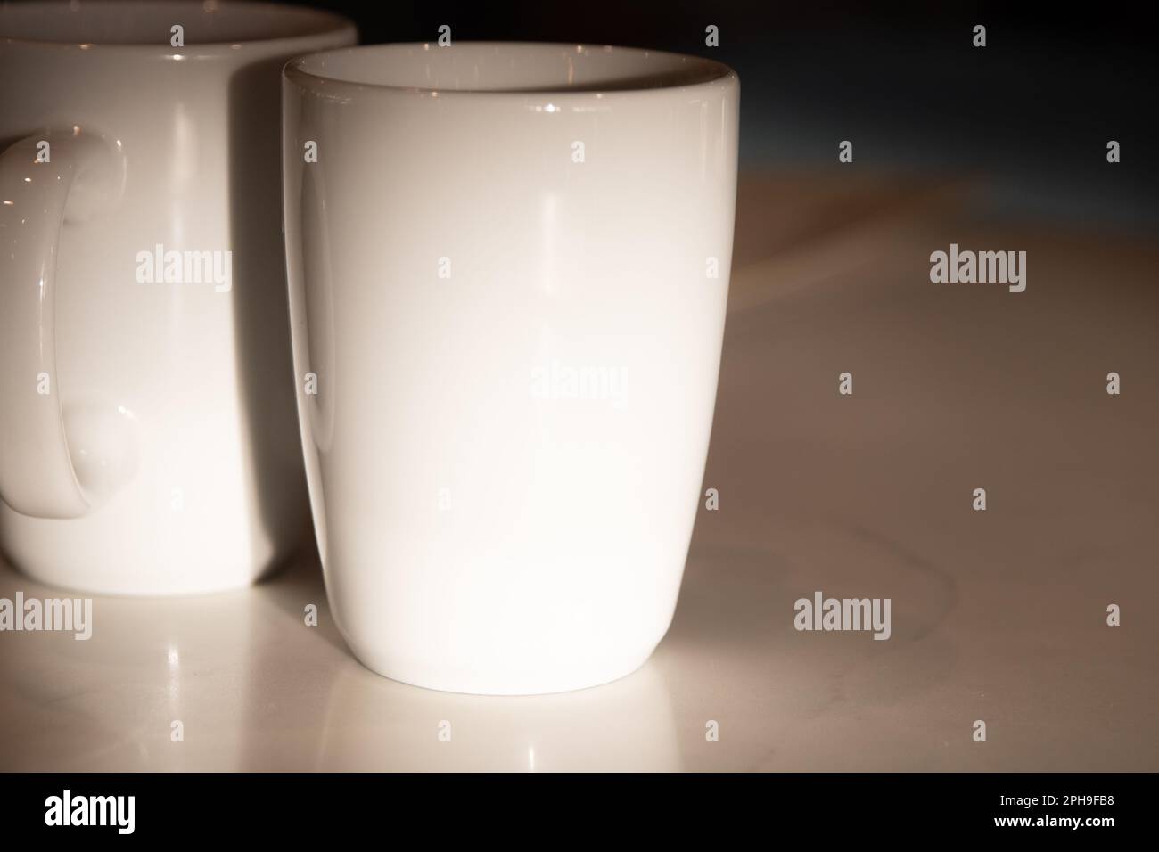 Two blank coffee mugs with copy space Stock Photo - Alamy