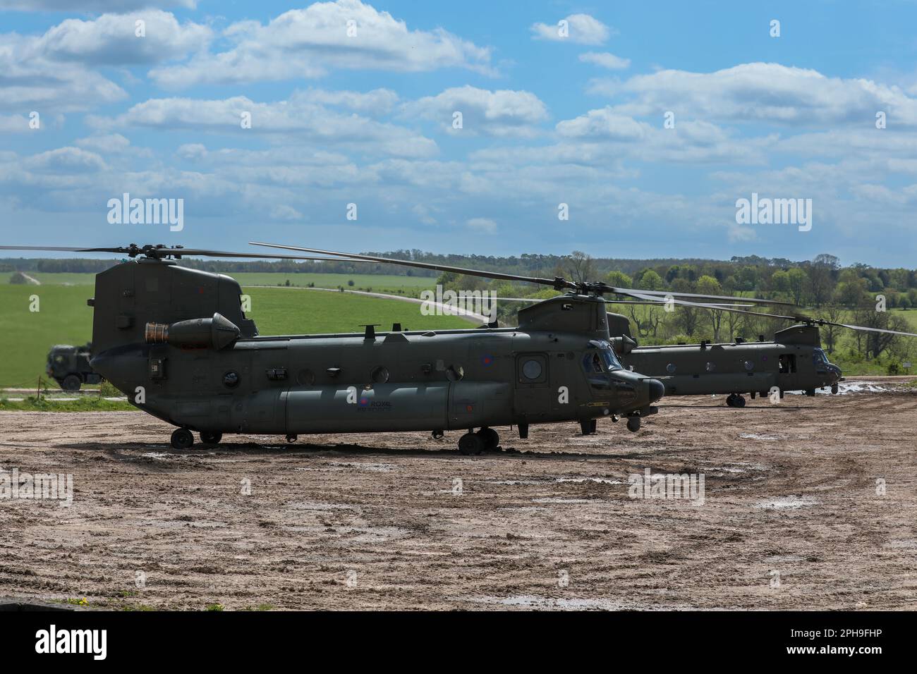 Two CH47 Chinook helicopters operated by the RAF preparing to take off ...
