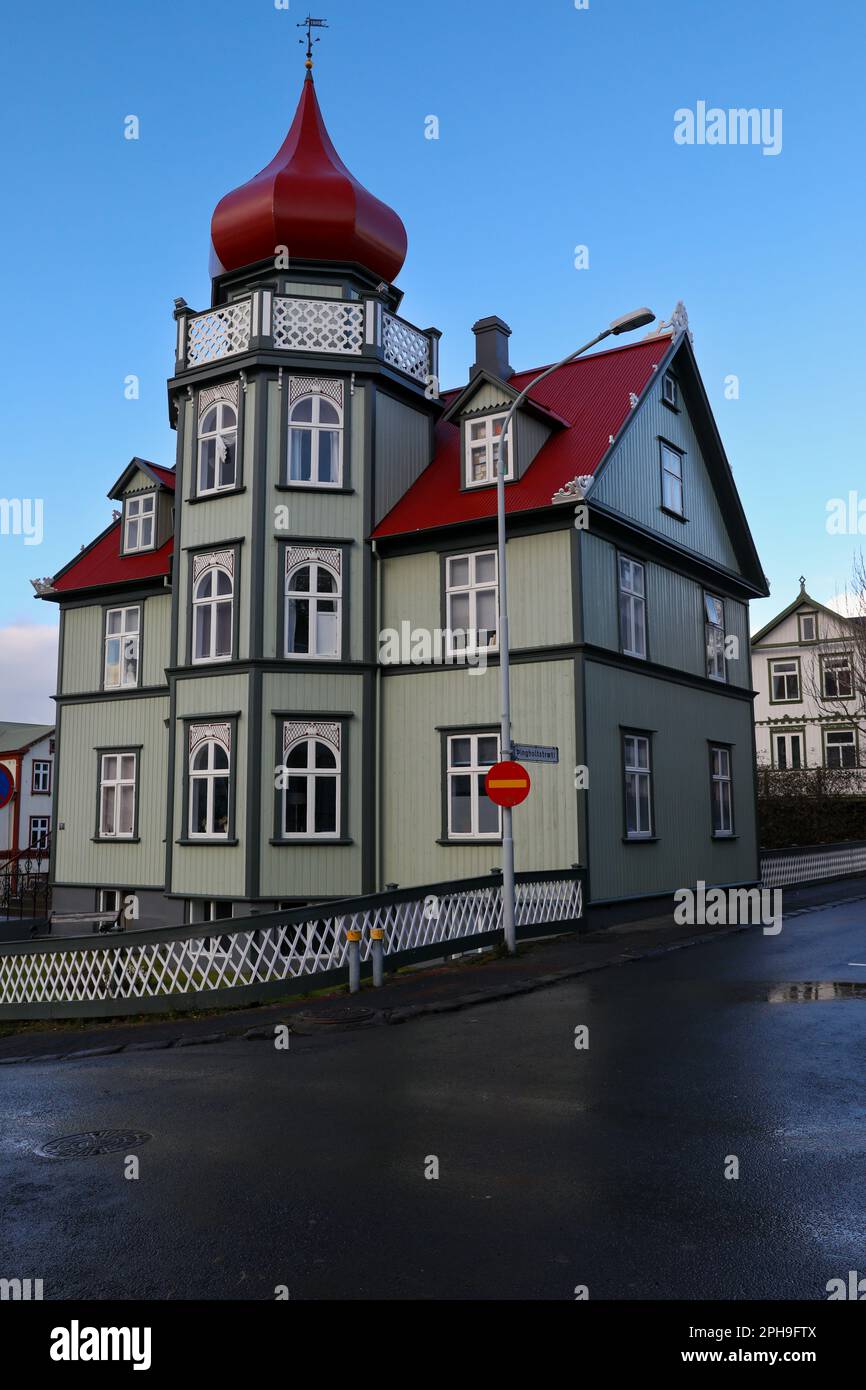 Traditional Icelandic house home with red dome steeple in downtown ...