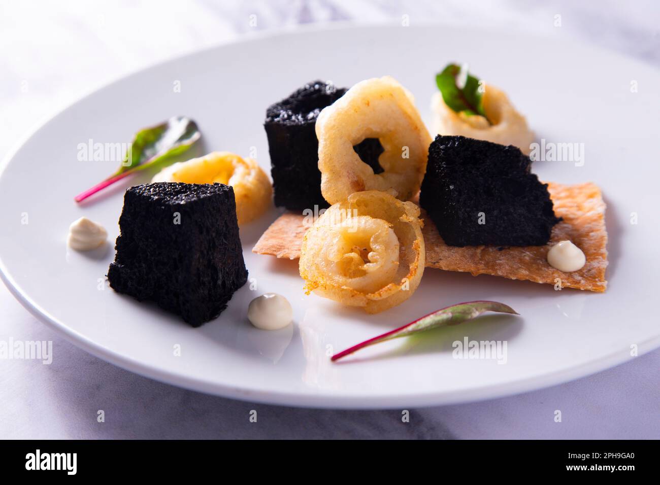 Delicious sandwich with calamari. Traditional recipe from Madrid Stock ...
