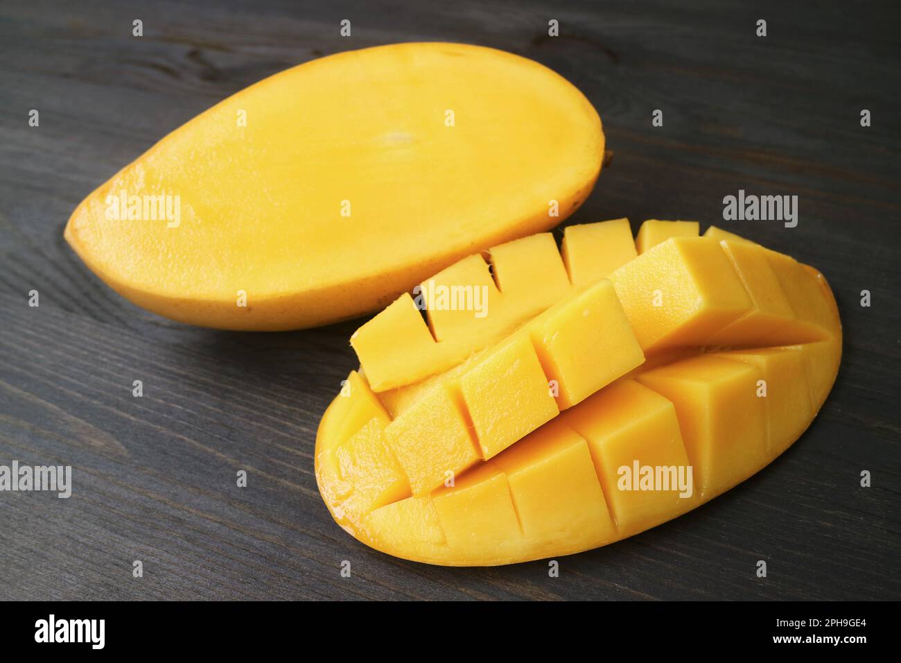 Mouthwatering Fresh Ripe Mango Cut in Half and Crosswise Cut Isolated ...