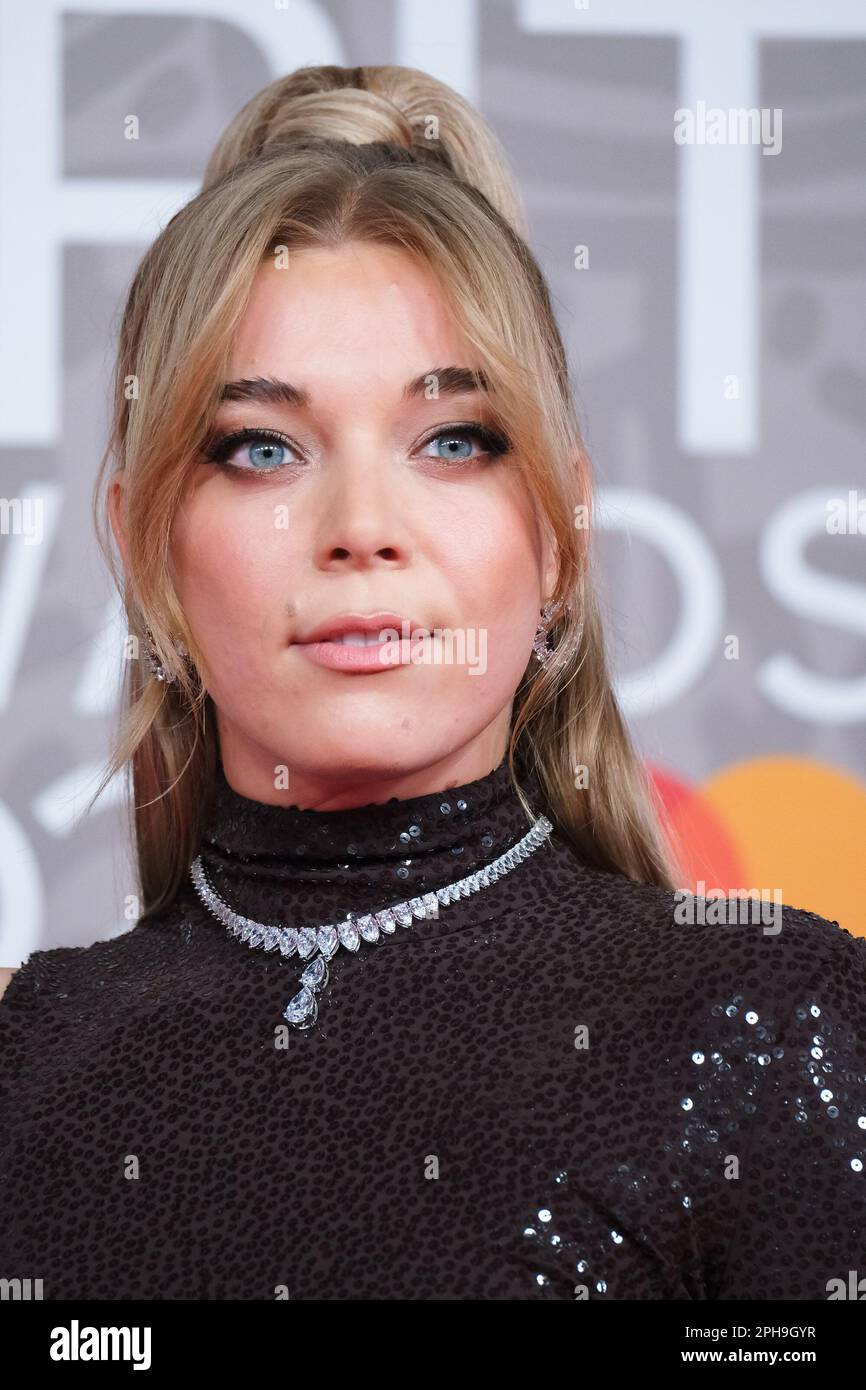 Becky Hill photographed attending The BRITS Red Carpet Arrivals at The ...