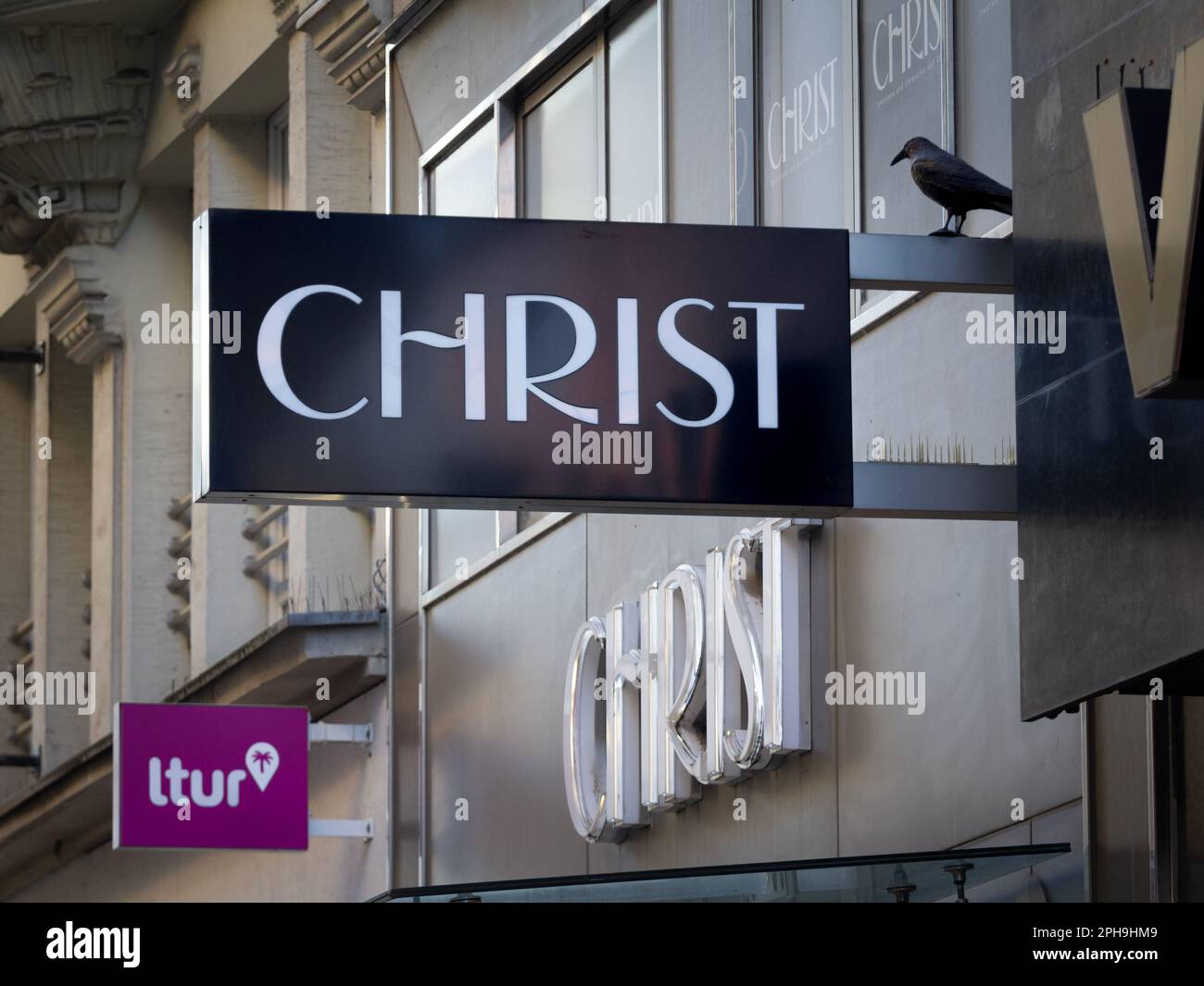 Picture of a sign with the logo of Christ on their main jewelry store ...