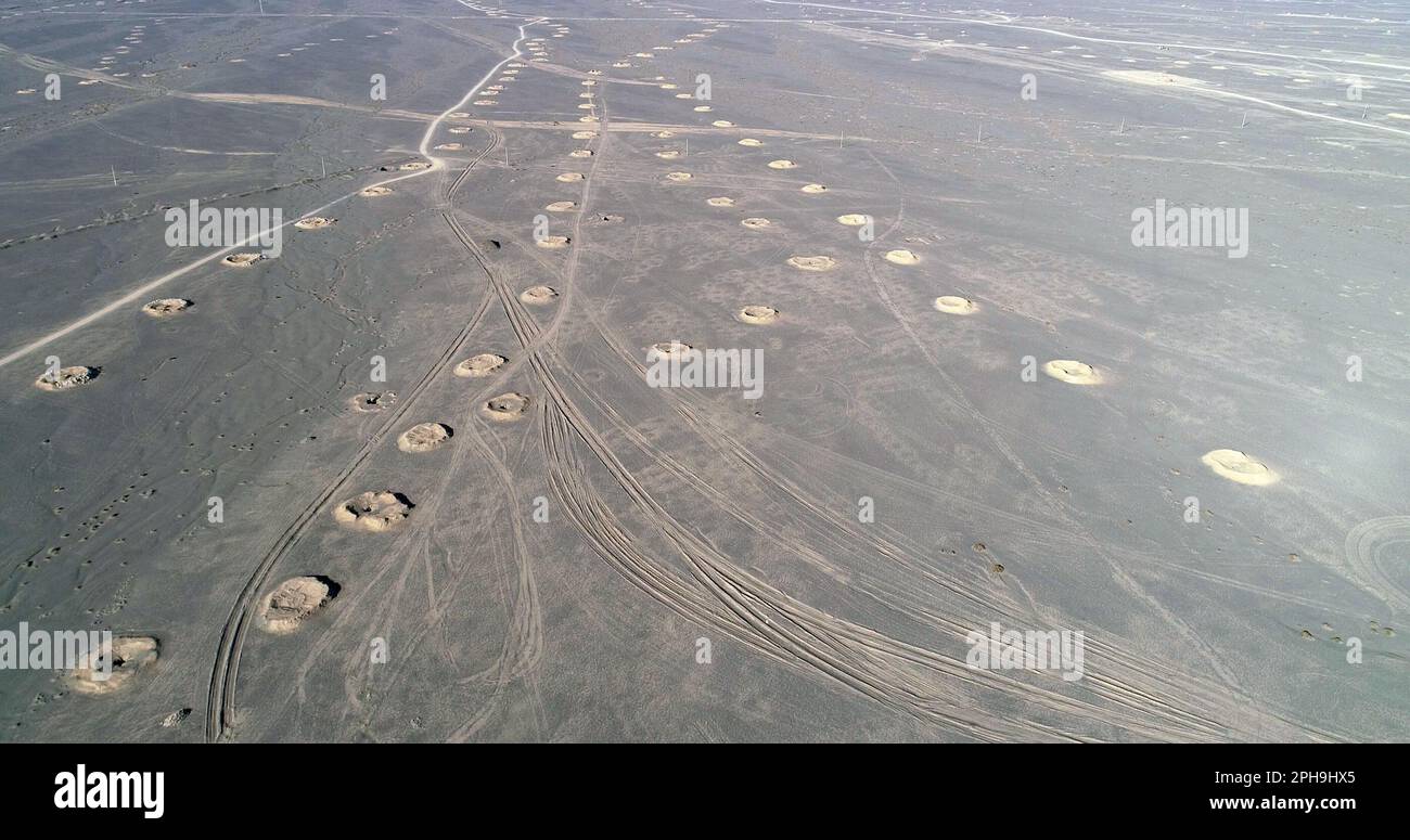 HAMI, CHINA - MARCH 26, 2023 - Aerial photo of Karez in the desert in ...