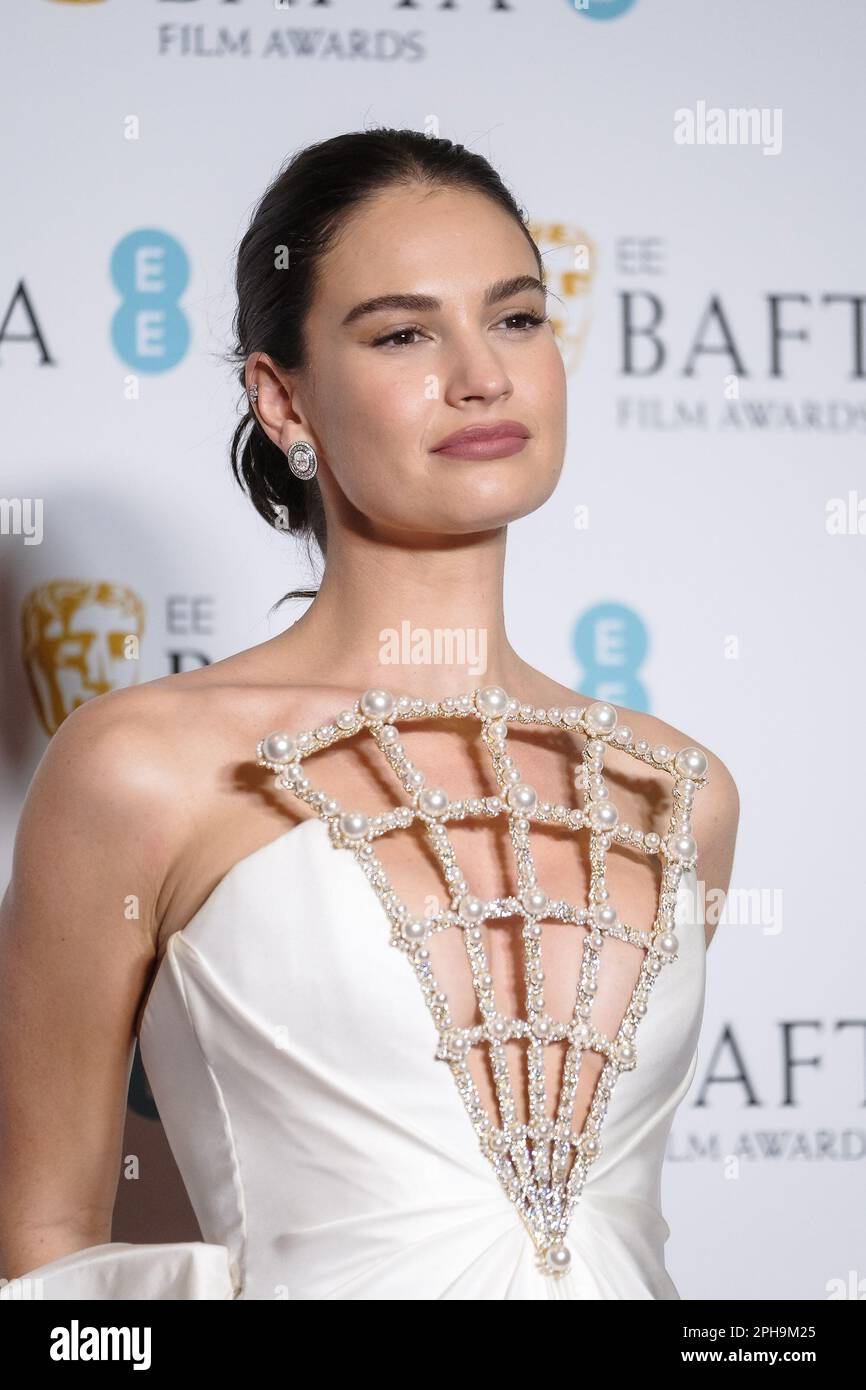 Lily James photographed in the 2023 EE BAFTA Film Awards Winner press ...
