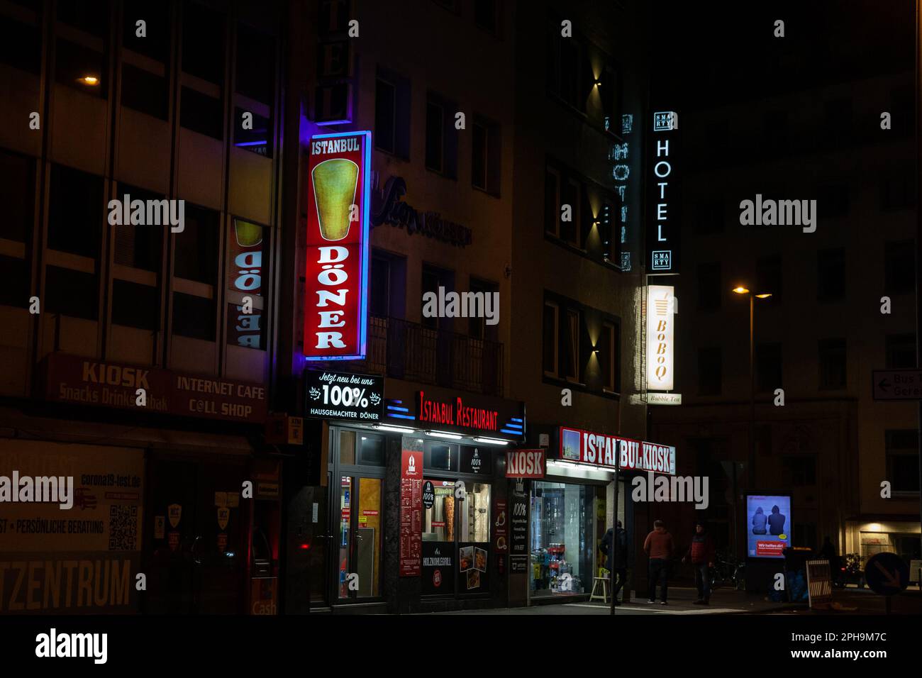 Picture of a street of Cologne, Germany at night, with a Kebab Fast ...