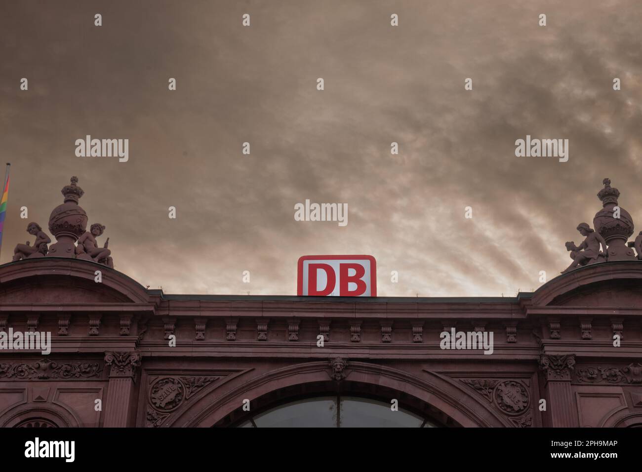 Picture of a sign with the logo of Deutsche Bahn on Bonn Train station ...