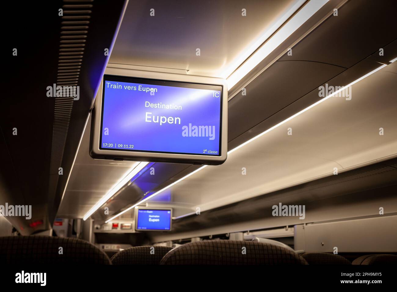Picture of a train screen in a passengers train indicating the next ...
