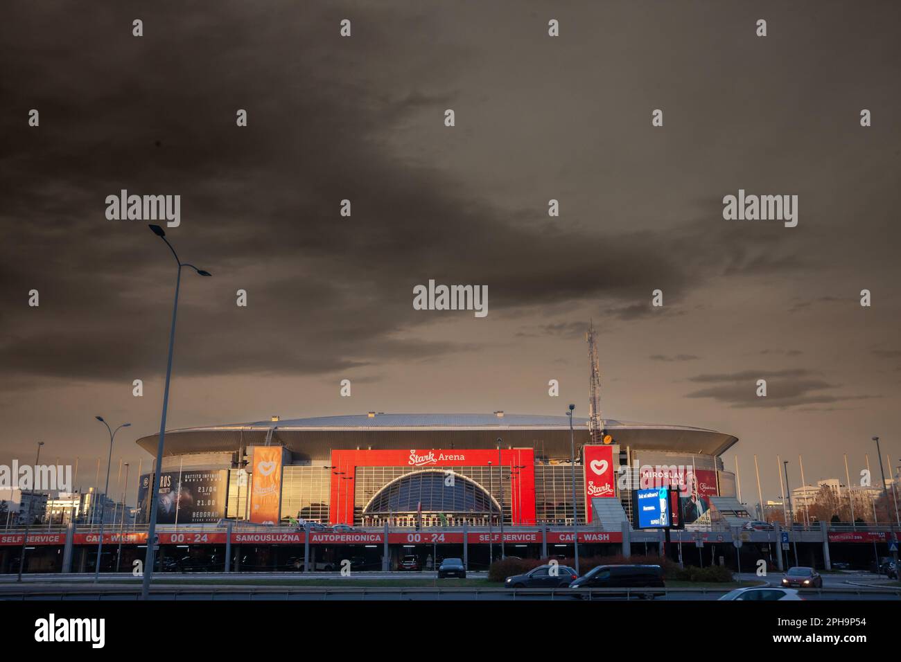 Picture of the Belgrade Stark Arena at dusk, seen from afar. The Štark ...