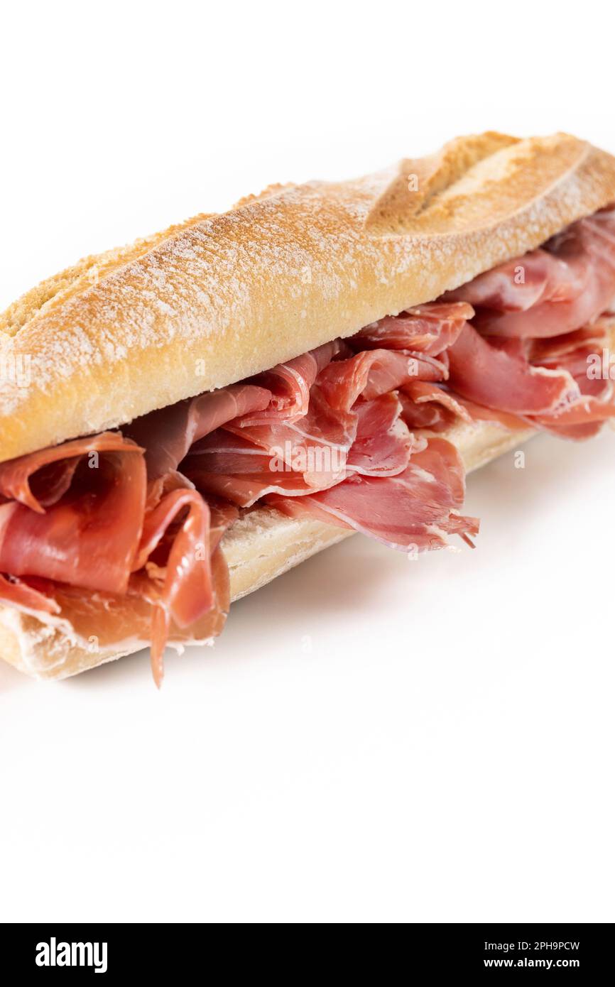 Spanish serrano ham sandwich isolated on white background Stock Photo ...