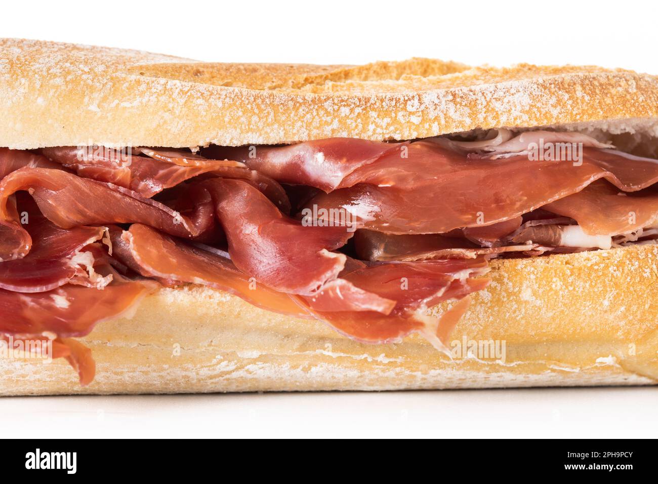 Spanish serrano ham sandwich isolated on white background Stock Photo ...