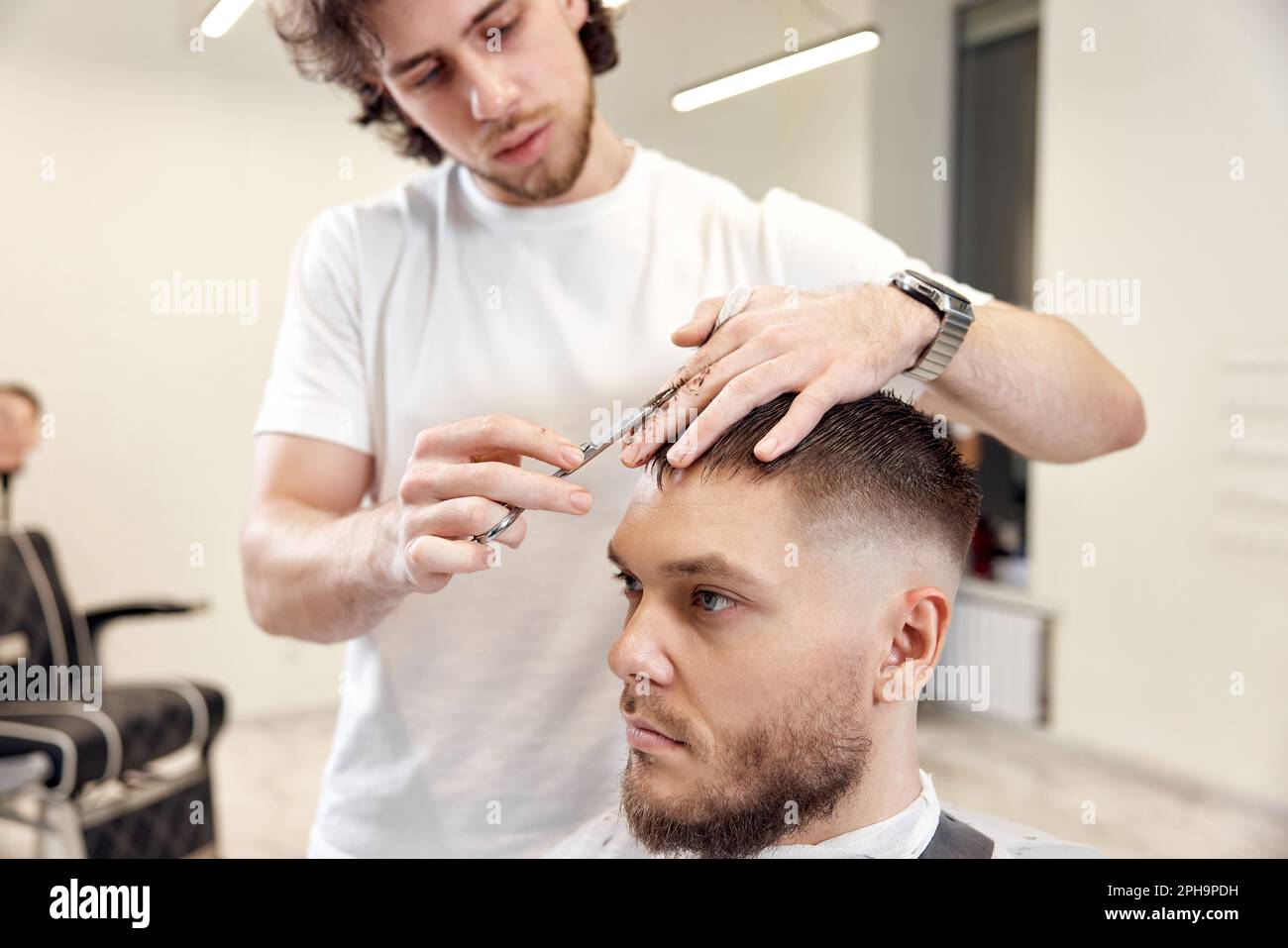 Barber using scissor trim hi-res stock photography and images - Alamy