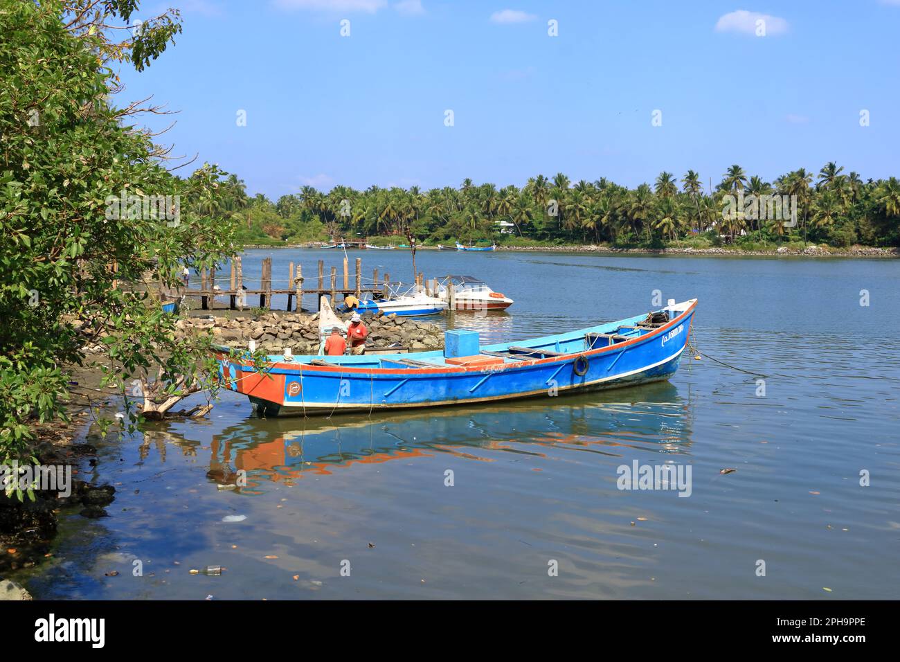 the lake and backwaters behind Dharmadam beach in Kannur, Kerala in ...