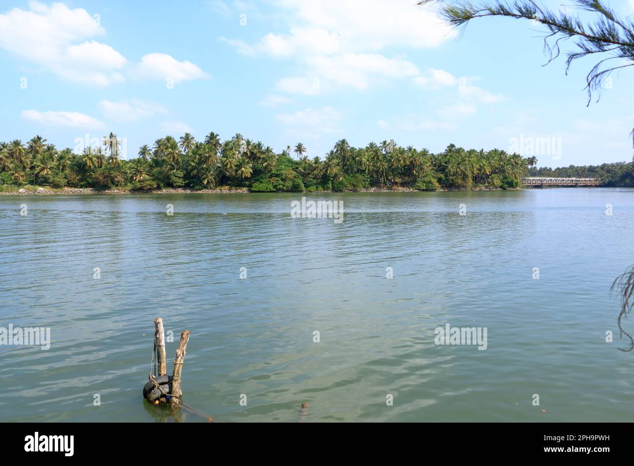 the lake and backwaters behind Dharmadam beach in Kannur, Kerala in ...