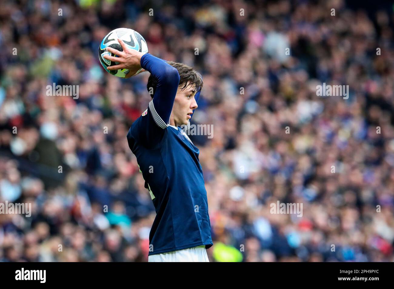 Aaron Hickey, who plays left back for Brentford, playing in the game ...