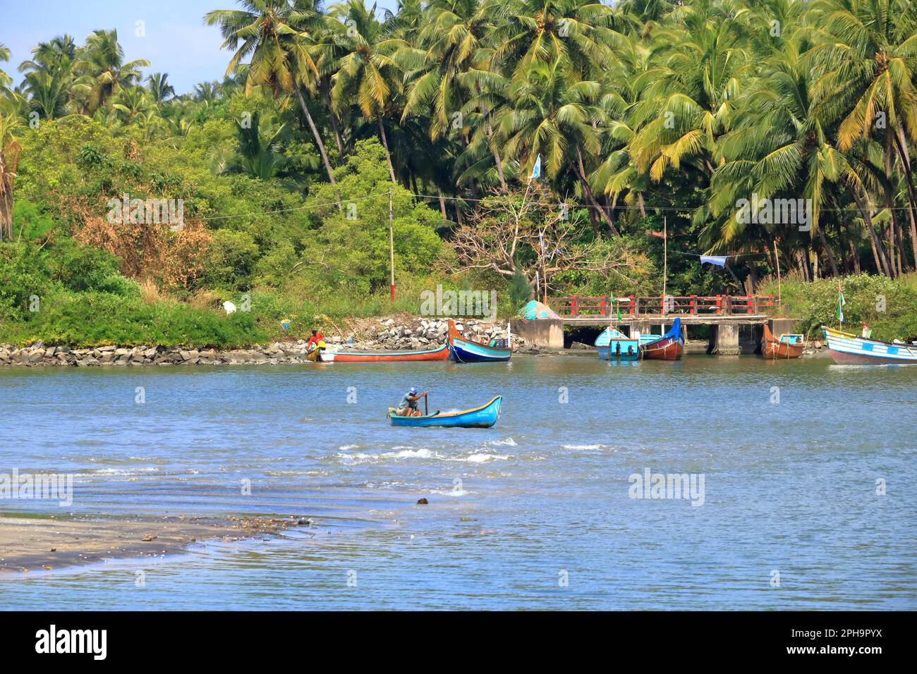 the lake and backwaters behind Dharmadam beach in Kannur, Kerala in ...