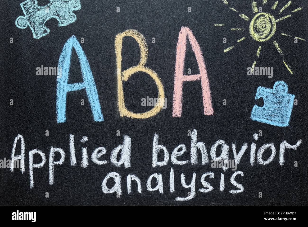 Text ABA Applied behavior analysis and drawings on blackboard Stock ...